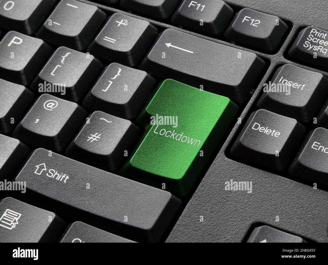A Modern Black Computer Keyboard With Return Key Coloured Green and ...