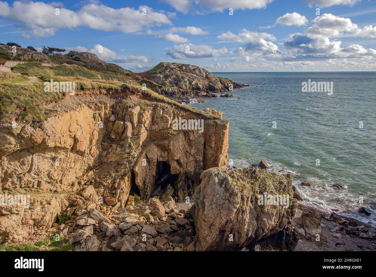 The Peninsula of Howth Head in sunny and cloudy day, hidden bay ...