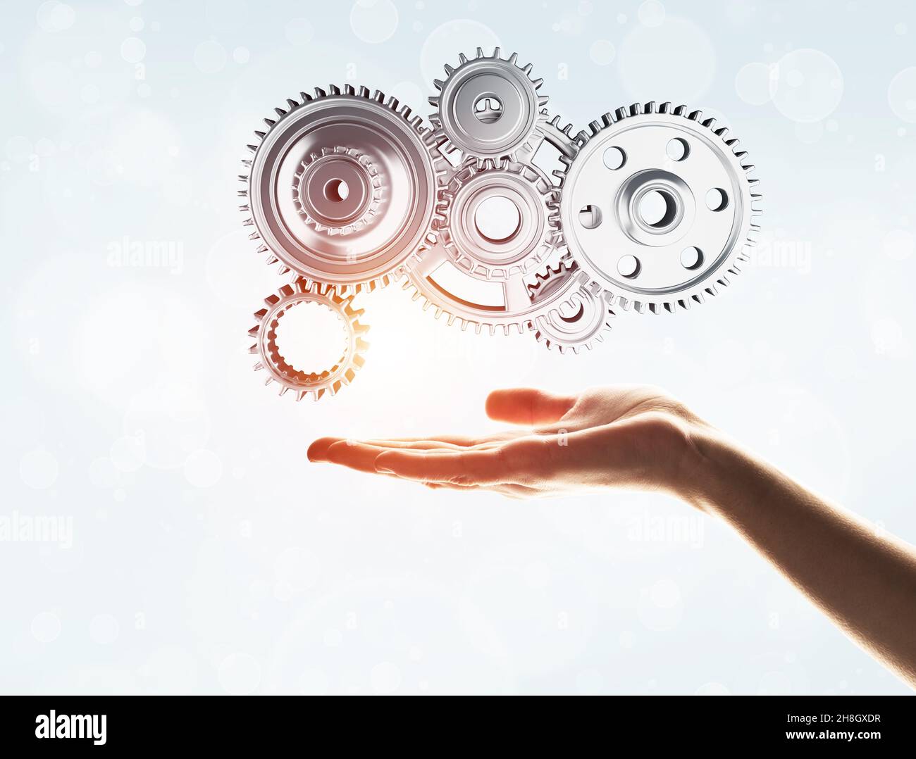 Concept of teamwork and cooperation presented with working gear engine ...