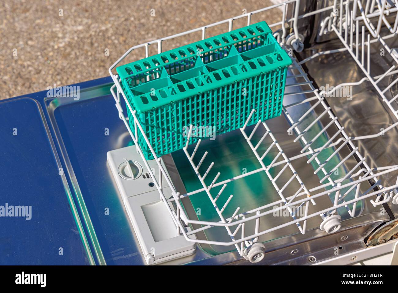 Open Door Lower Rack at Small Dishwasher Stock Photo - Alamy