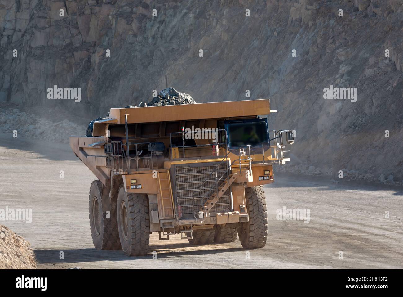 Ore extraction. The bulldozer car for transporting minerals, cop Stock ...