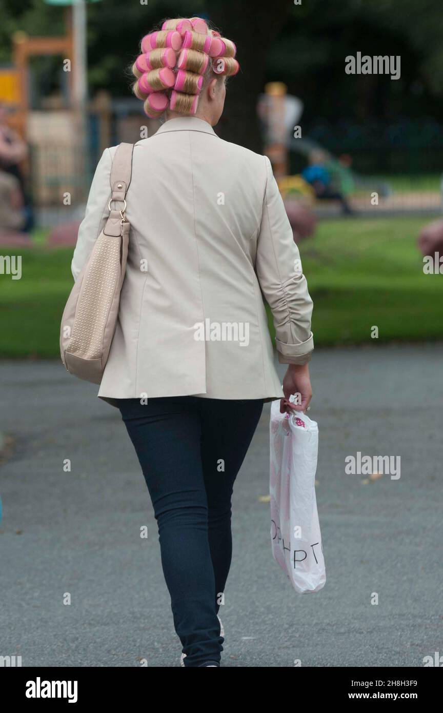 Lady hair in rollers hi-res stock photography and images - Alamy
