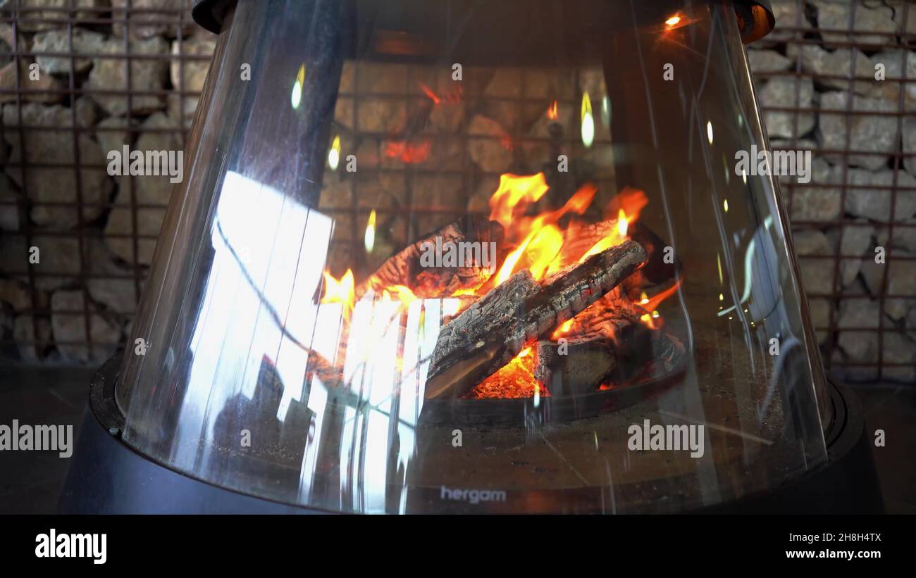 Fireplace making fire to heat Stock Photo - Alamy