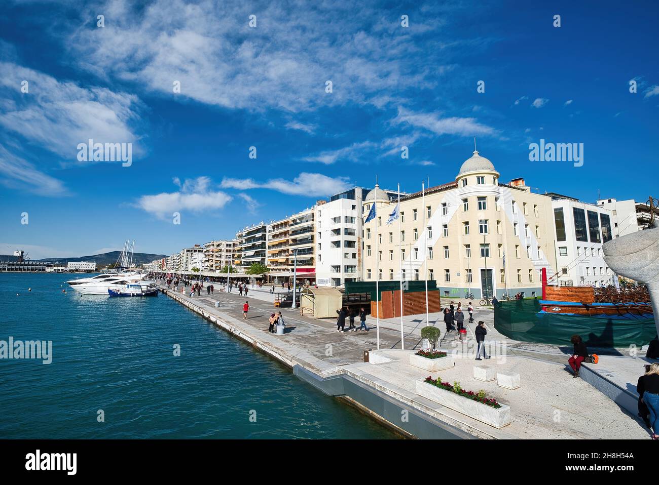 Volos city, beautiful waterfront with the emblem of the city, mythical ...