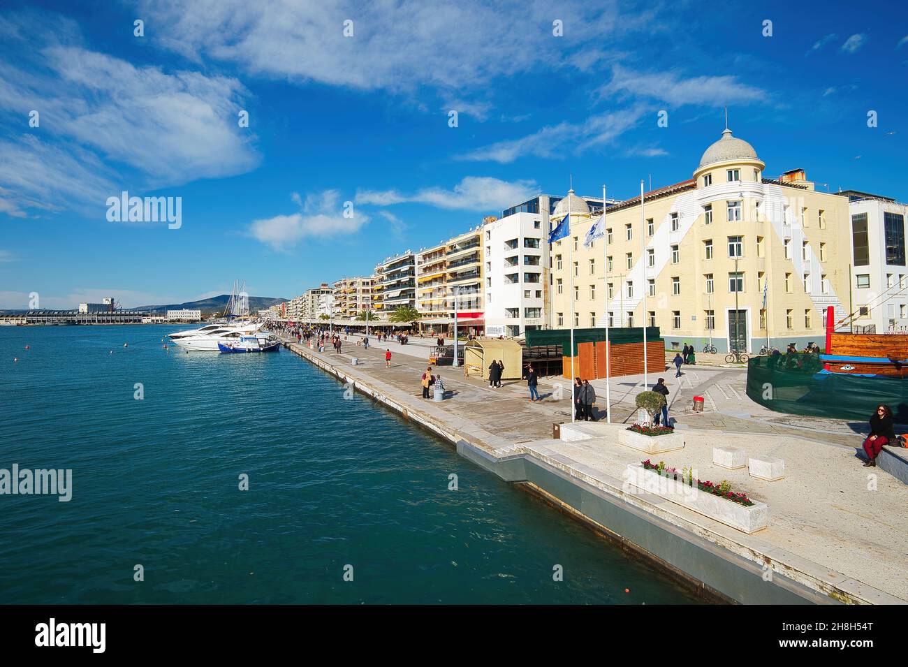 Volos city, beautiful waterfront with the emblem of the city, mythical ...