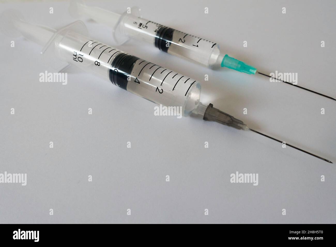 injection on a white surface Stock Photo - Alamy