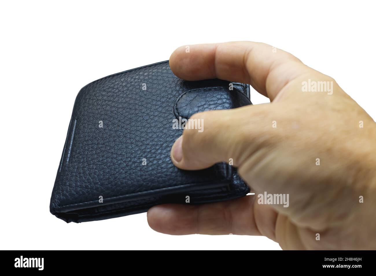 Black leather purse in hand close-up on a light background. Isolated ...