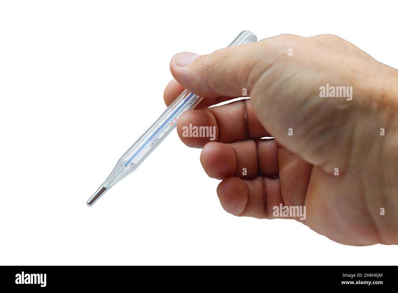 Mercury thermometer to measure body temperature in the hand. Isolated ...