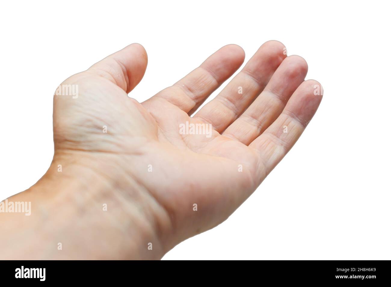 The outstretched hand of a man on a light background. Isolated Stock ...