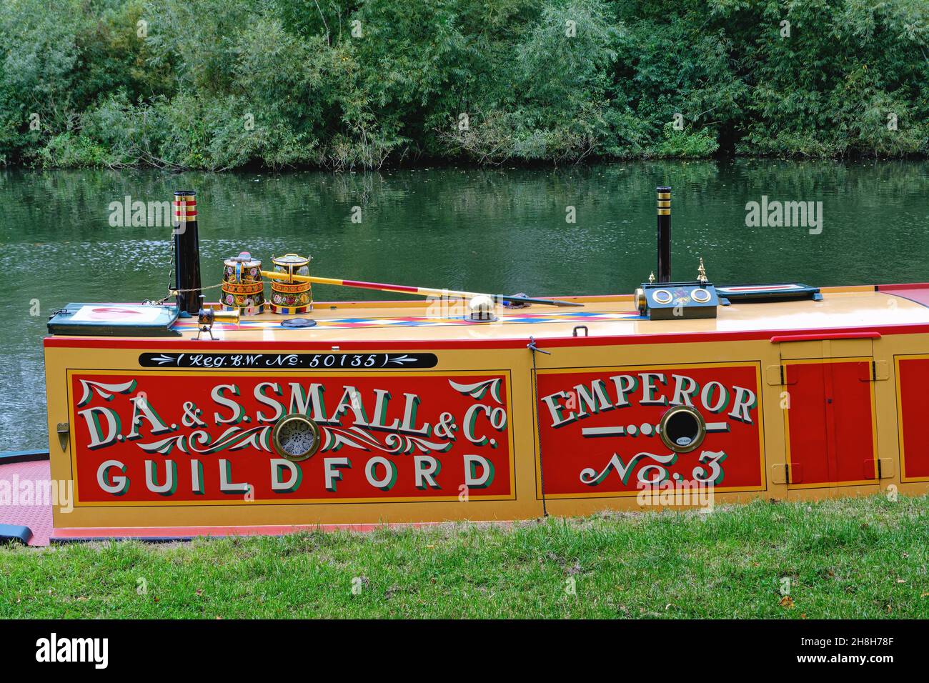 Traditional decorative paintwork on the side of a canal narrow boat ...