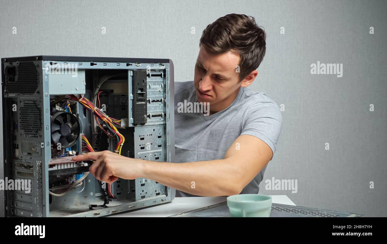 Man cleaning computer fan hi-res stock photography and images - Alamy
