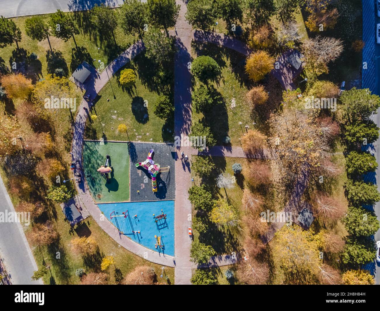 Top down aerial view of a playground for children in a public park ...
