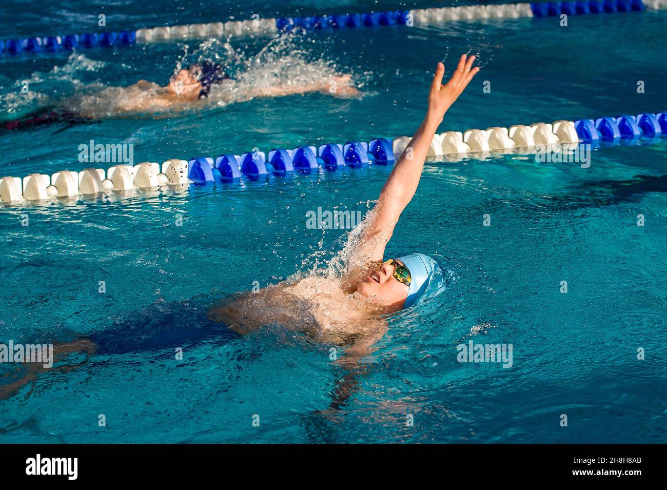 backstroke swimmer in the swiming pool Stock Photo - Alamy