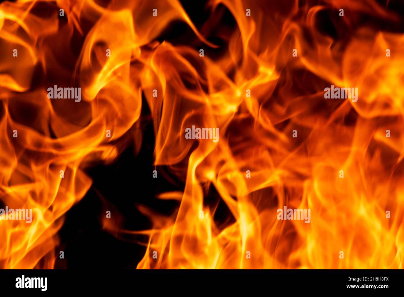Abstract flame, fire flame texture, background. Blurred moving tongues ...