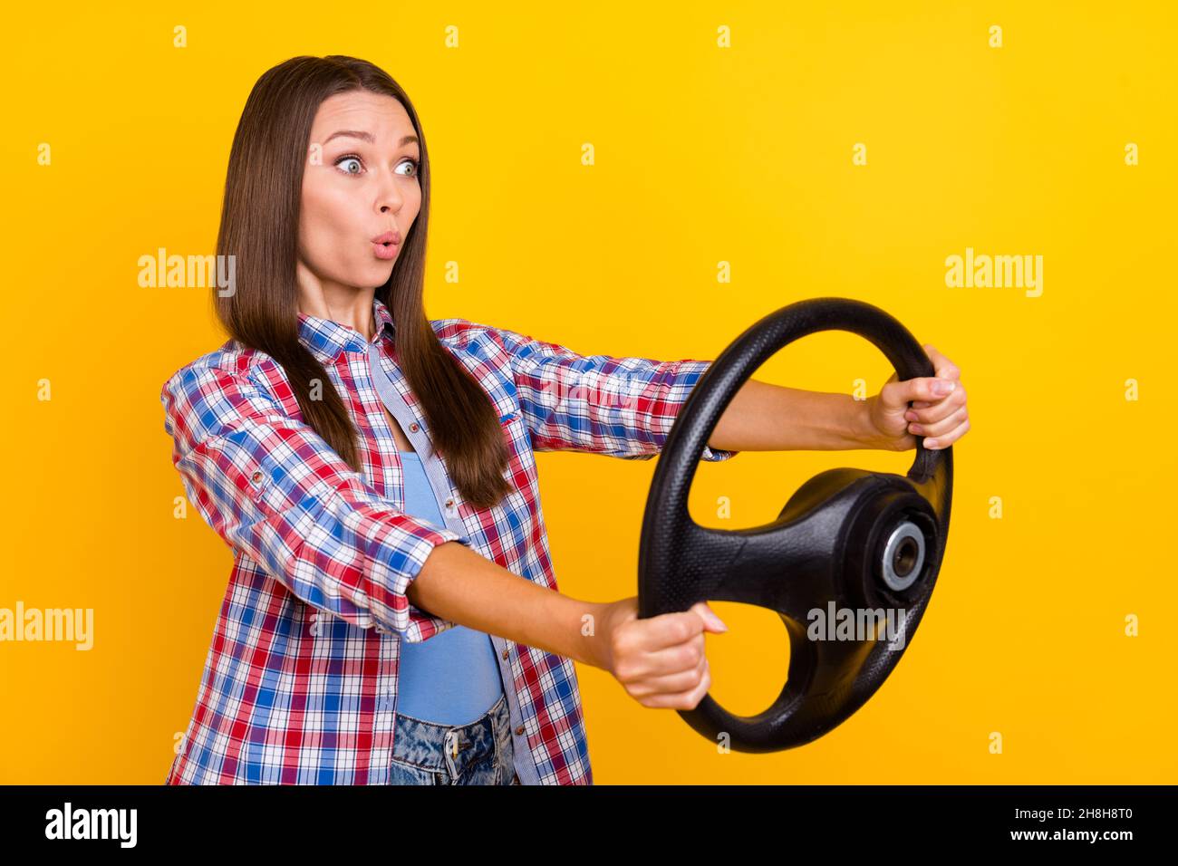Profile photo of amazed surprised driver lady hold steering ride fast ...