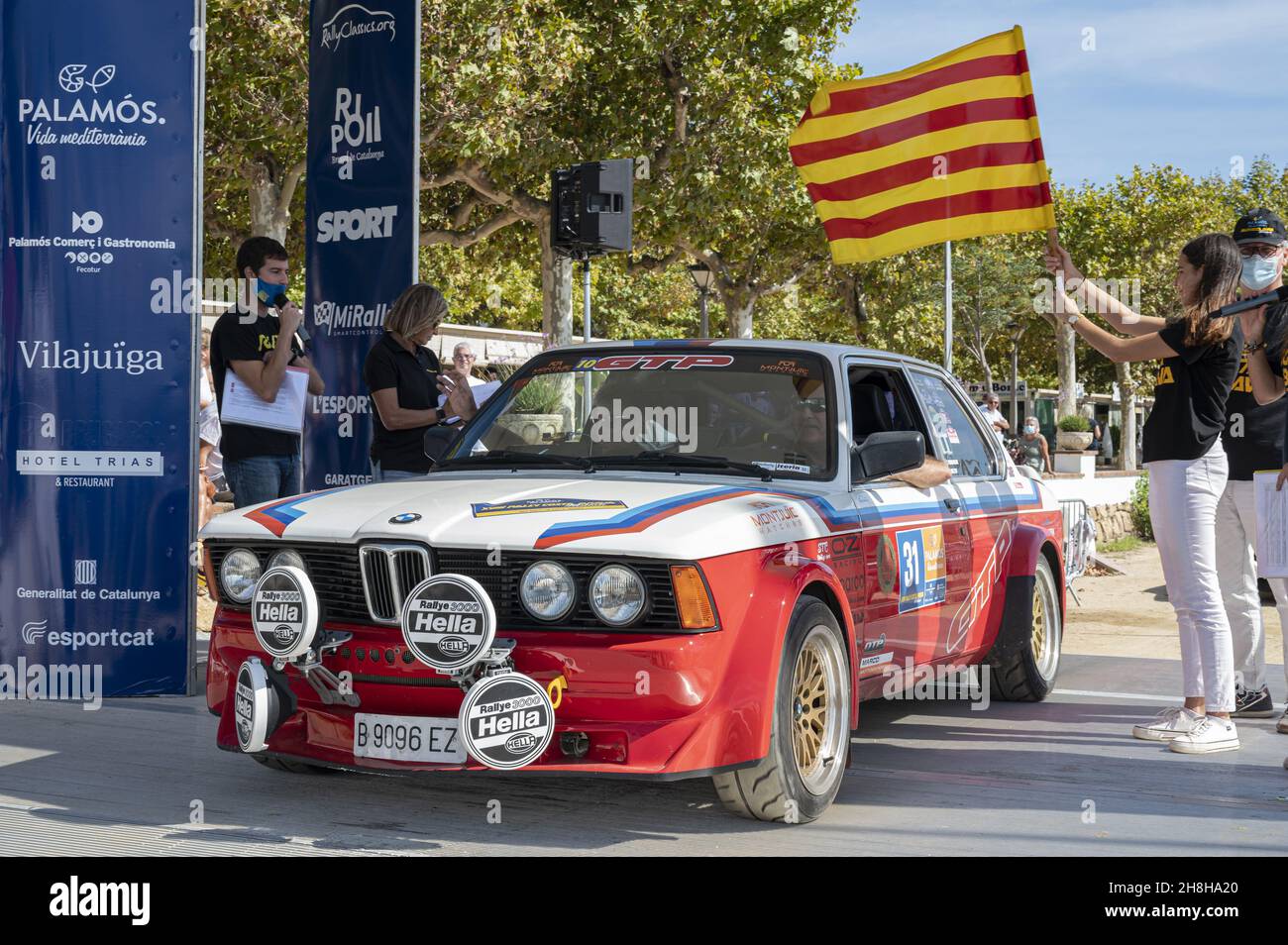 BARCELONA, SPAIN - Nov 03, 2021: A closeup of a red and white BMW E21 ...