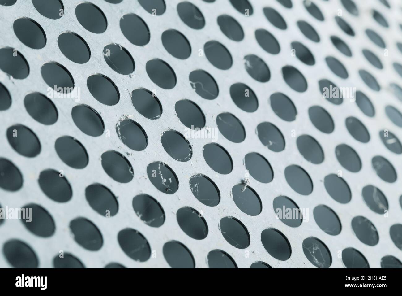 Round-hole grating as a structured background for design Stock Photo ...