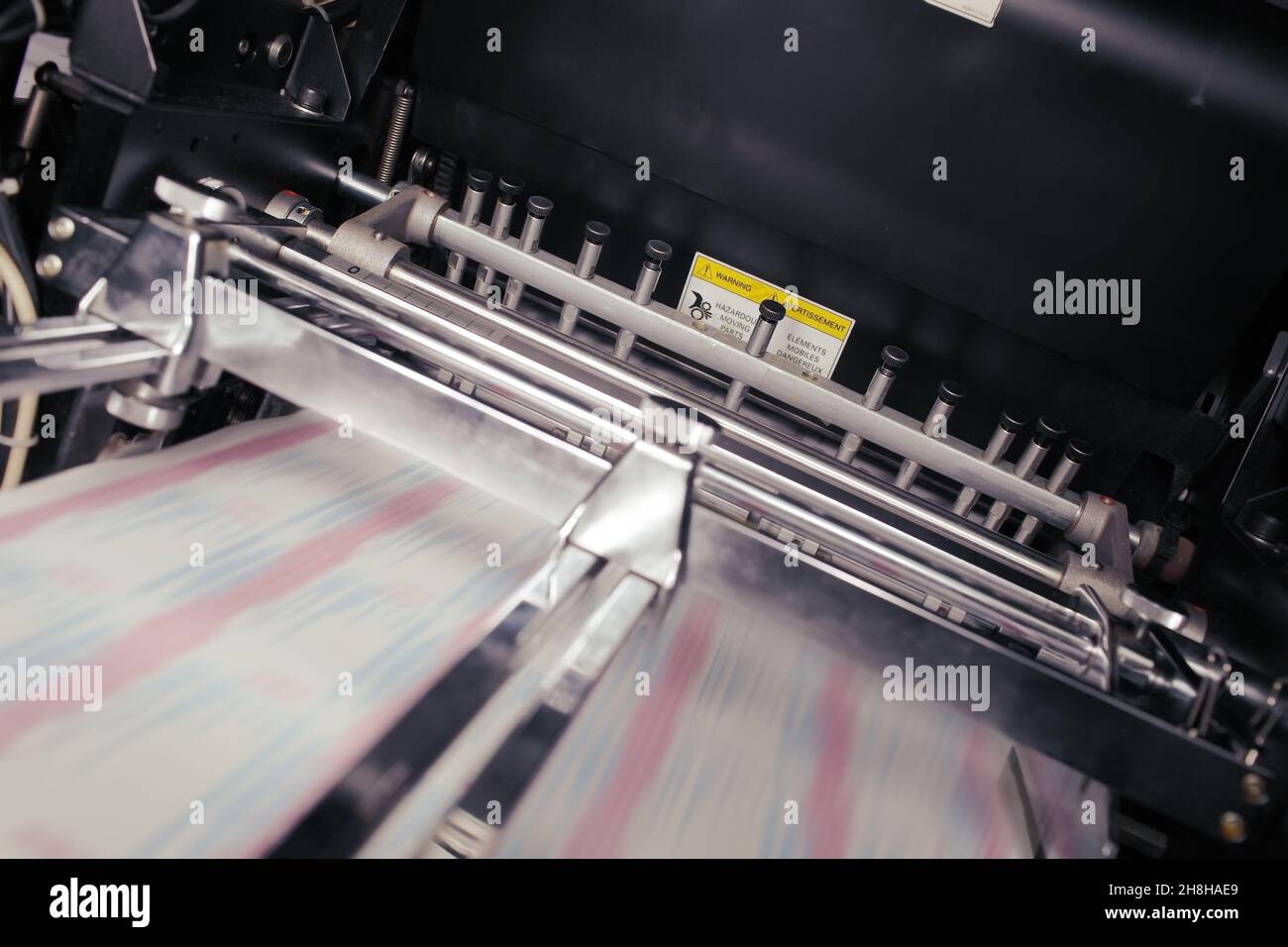 Blurred paper in motion during printing process Stock Photo - Alamy