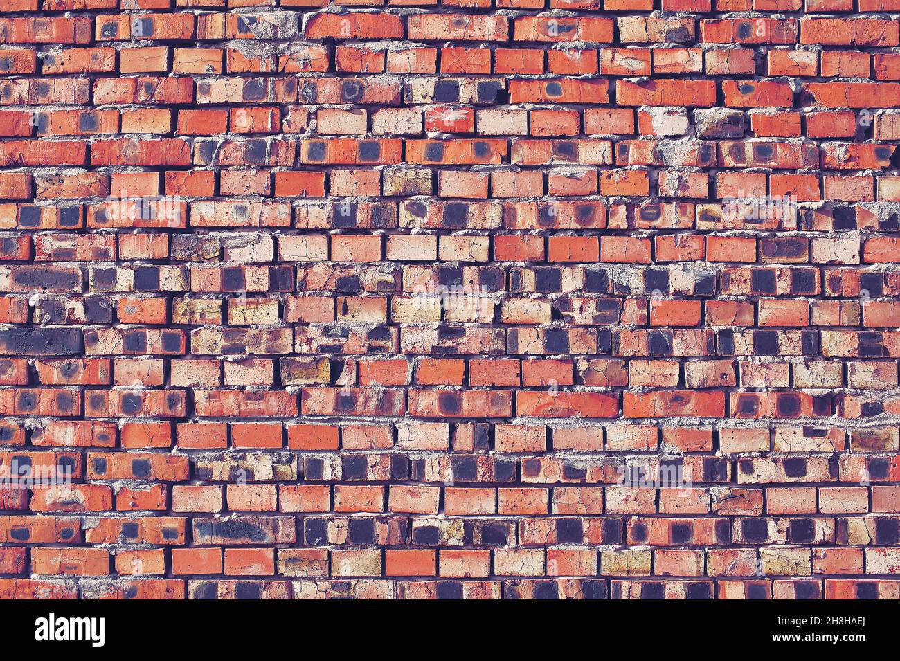 Wall of fired brick, textured background for design Stock Photo - Alamy
