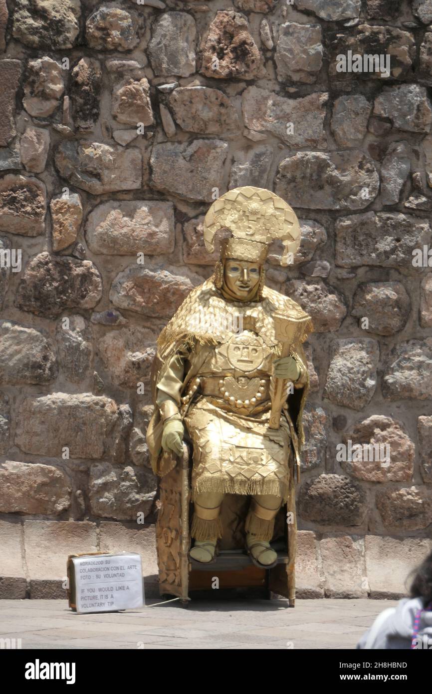 Person dressed as an Inca God at a Carnival in Lima Peru gold king ...