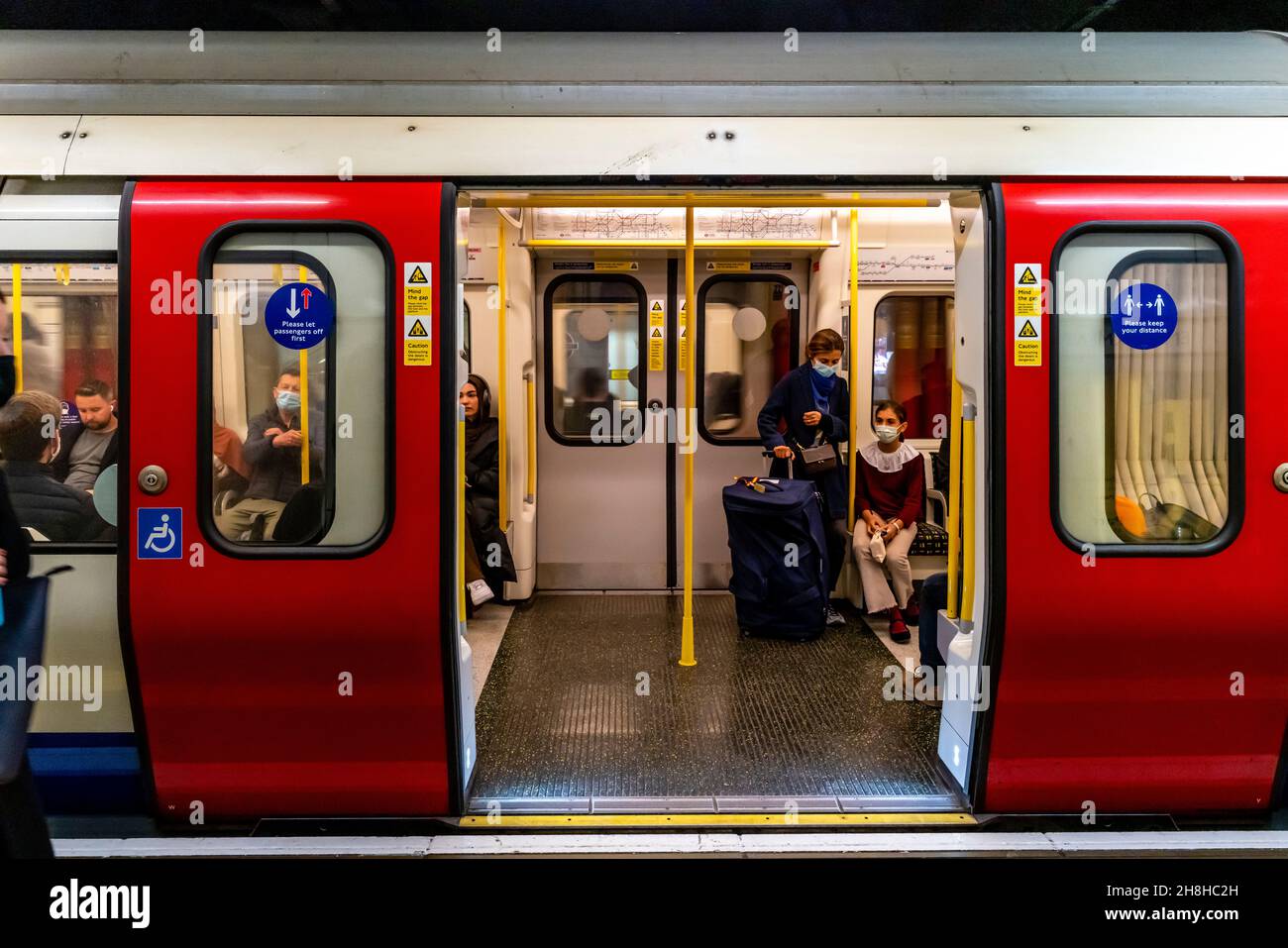 Passengers On Board A London Underground Train, London, UK Stock Photo ...