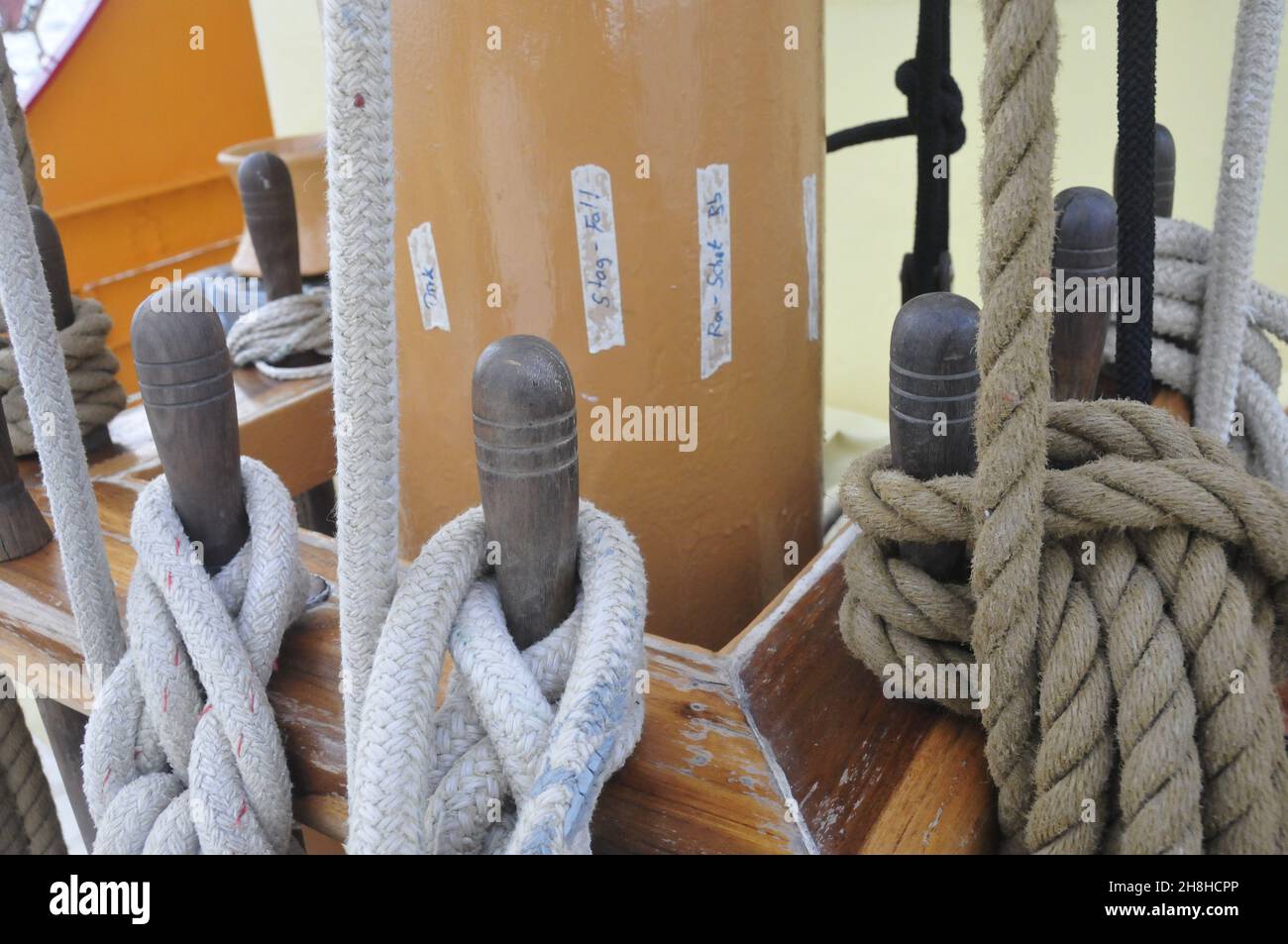 Document board with ropes on sailing ship Stock Photo - Alamy