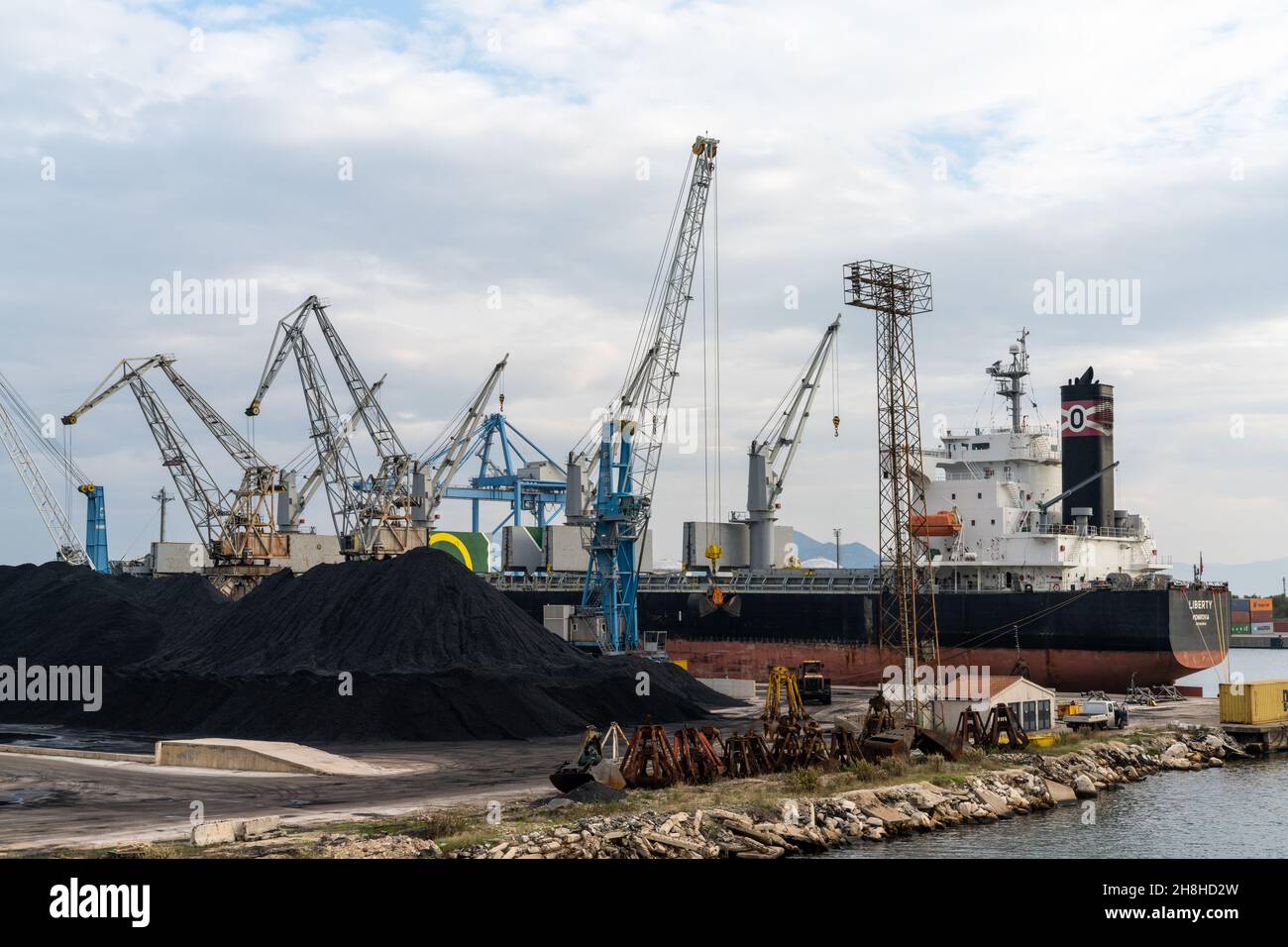 Ploce, Croatia - 18 November, 2021: harbor crane loading coal onto a ...