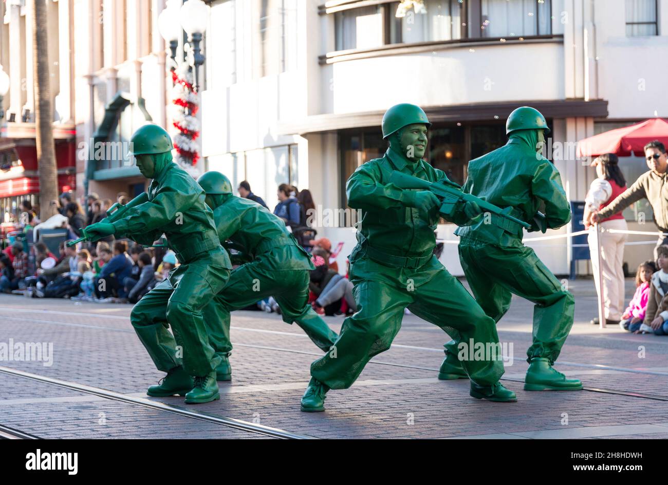 Disney's green army men parading on the street Stock Photo - Alamy