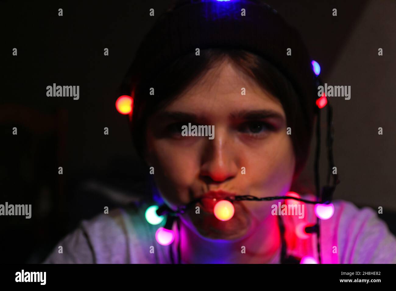 Mouth eating light bulb hi-res stock photography and images - Alamy