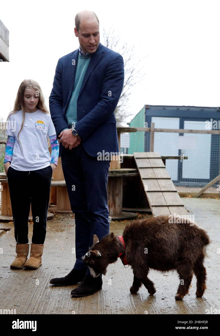 A goat named Hercules smells the Duke of Cambridge's shoes during a ...