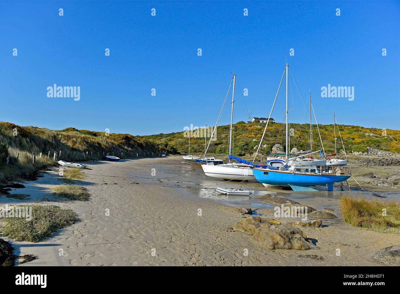France, Manche, Chausey Islands, sailboats at anchor under the ...