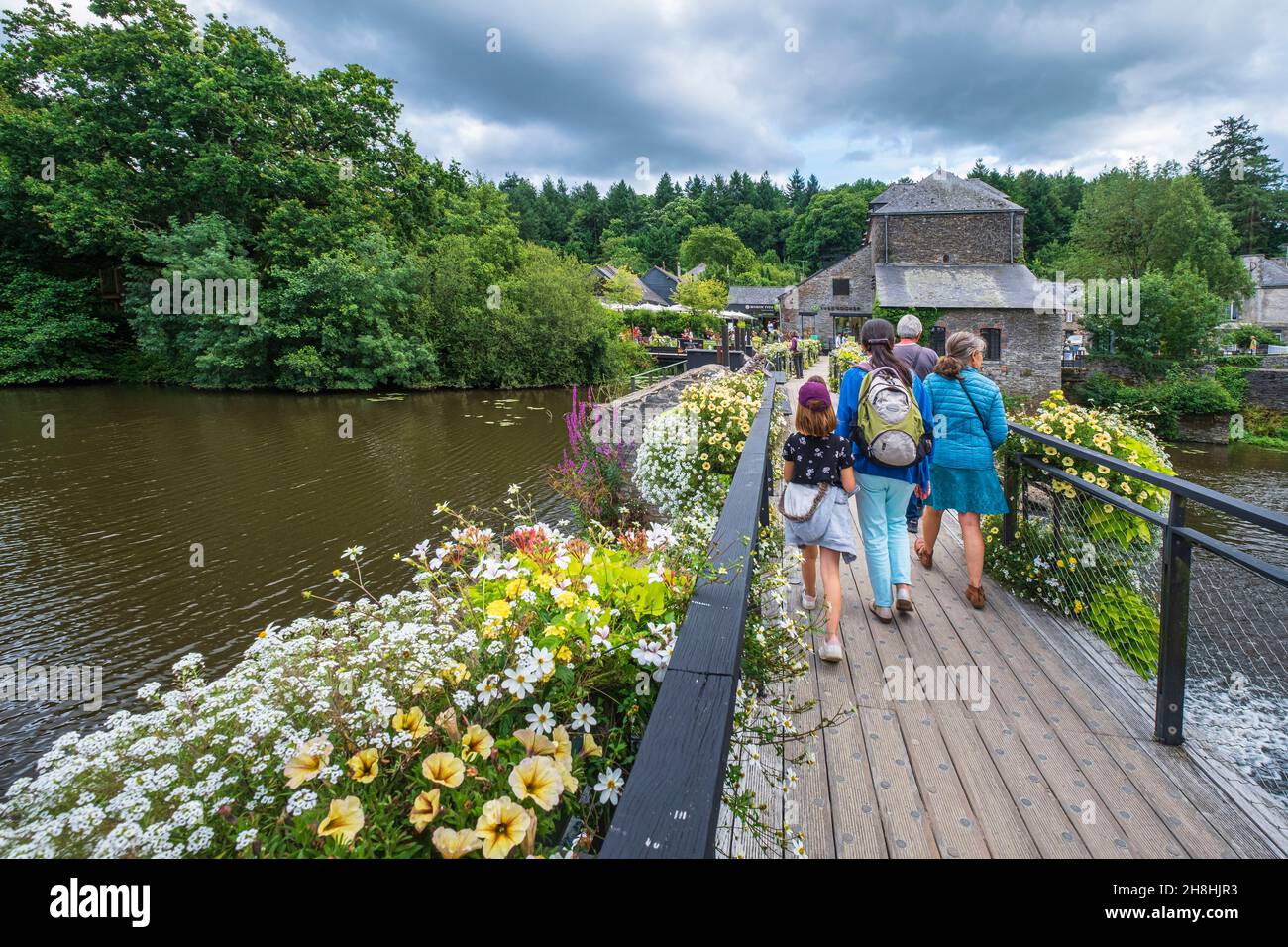France, Morbihan, La Gacilly, footbridge over the Aff river and Yves ...