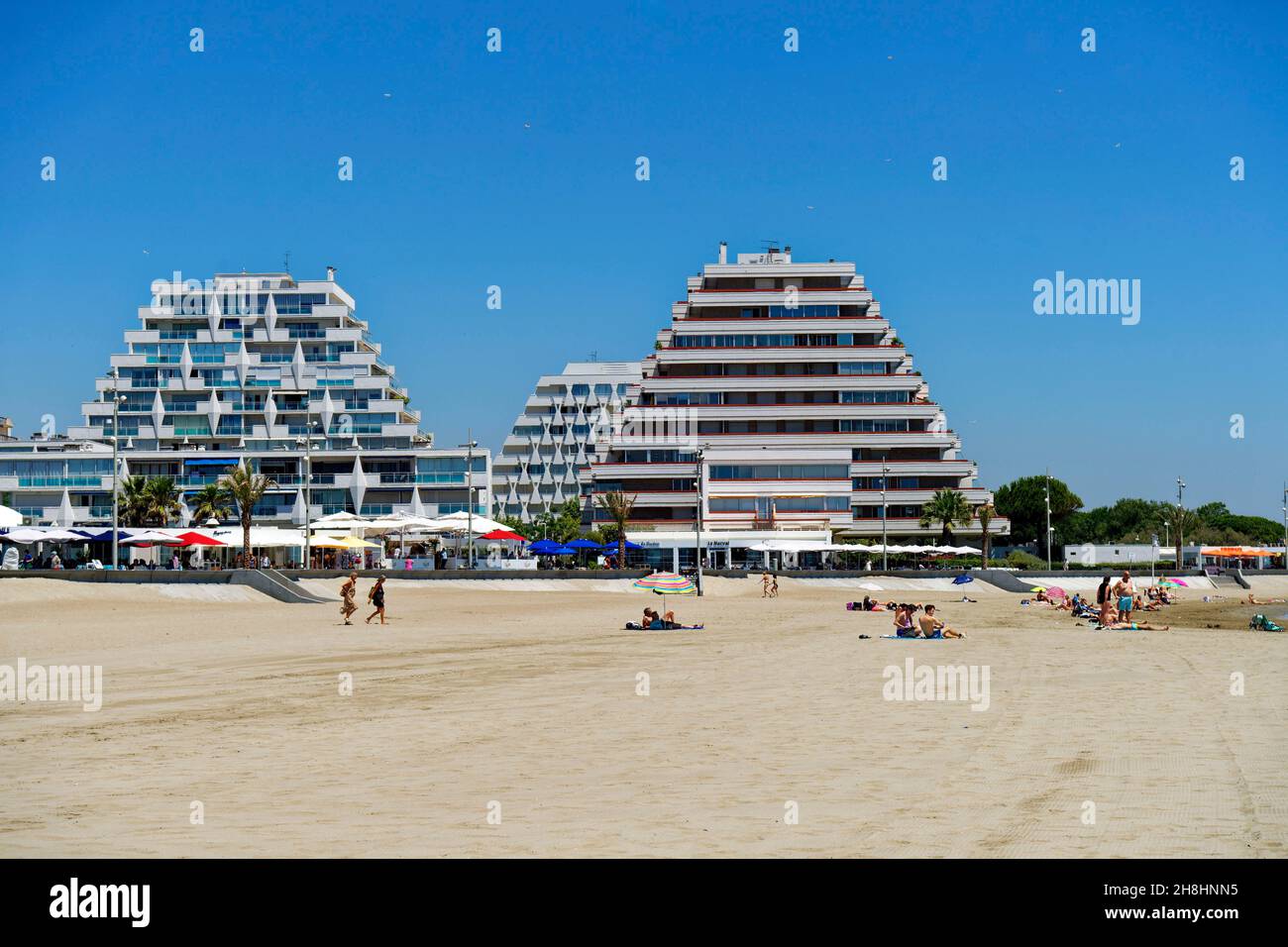 France, Herault, La Grande Motte, the resort beach with pyramidal ...