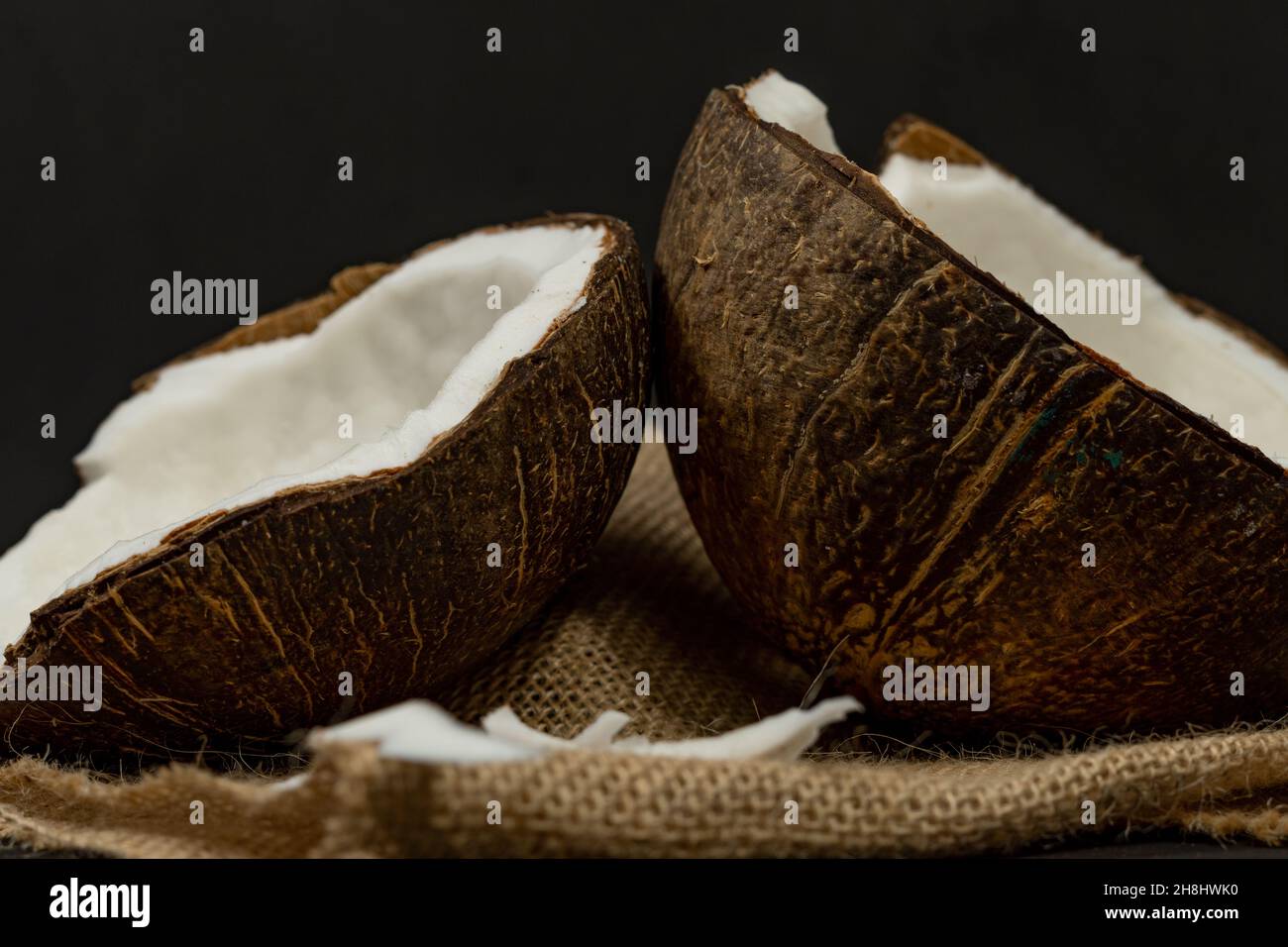 fresh coconut on black background Stock Photo - Alamy