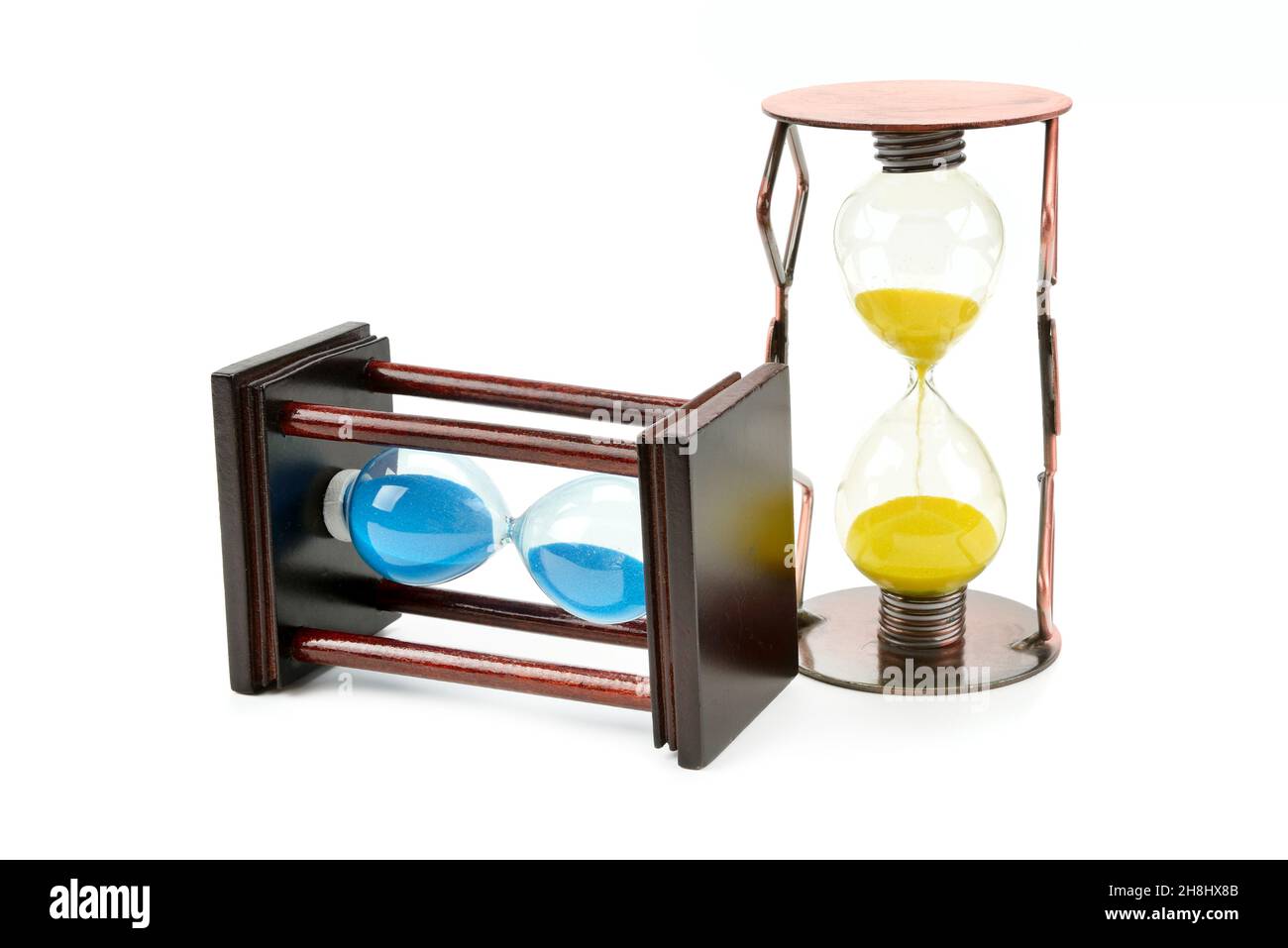 Hourglass isolated on white background. Sand running through the bulbs ...