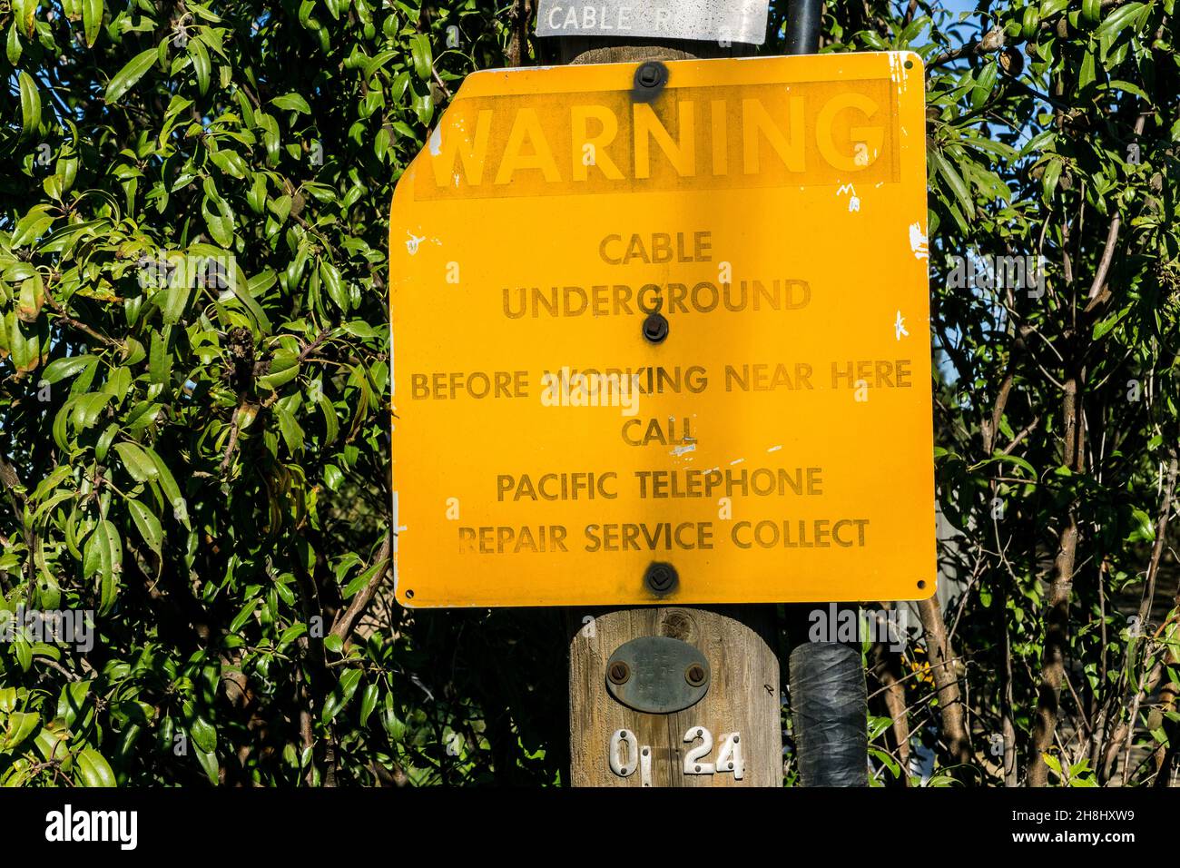 An old Pacific Telephone underground cable warning sign in Stanislaus ...