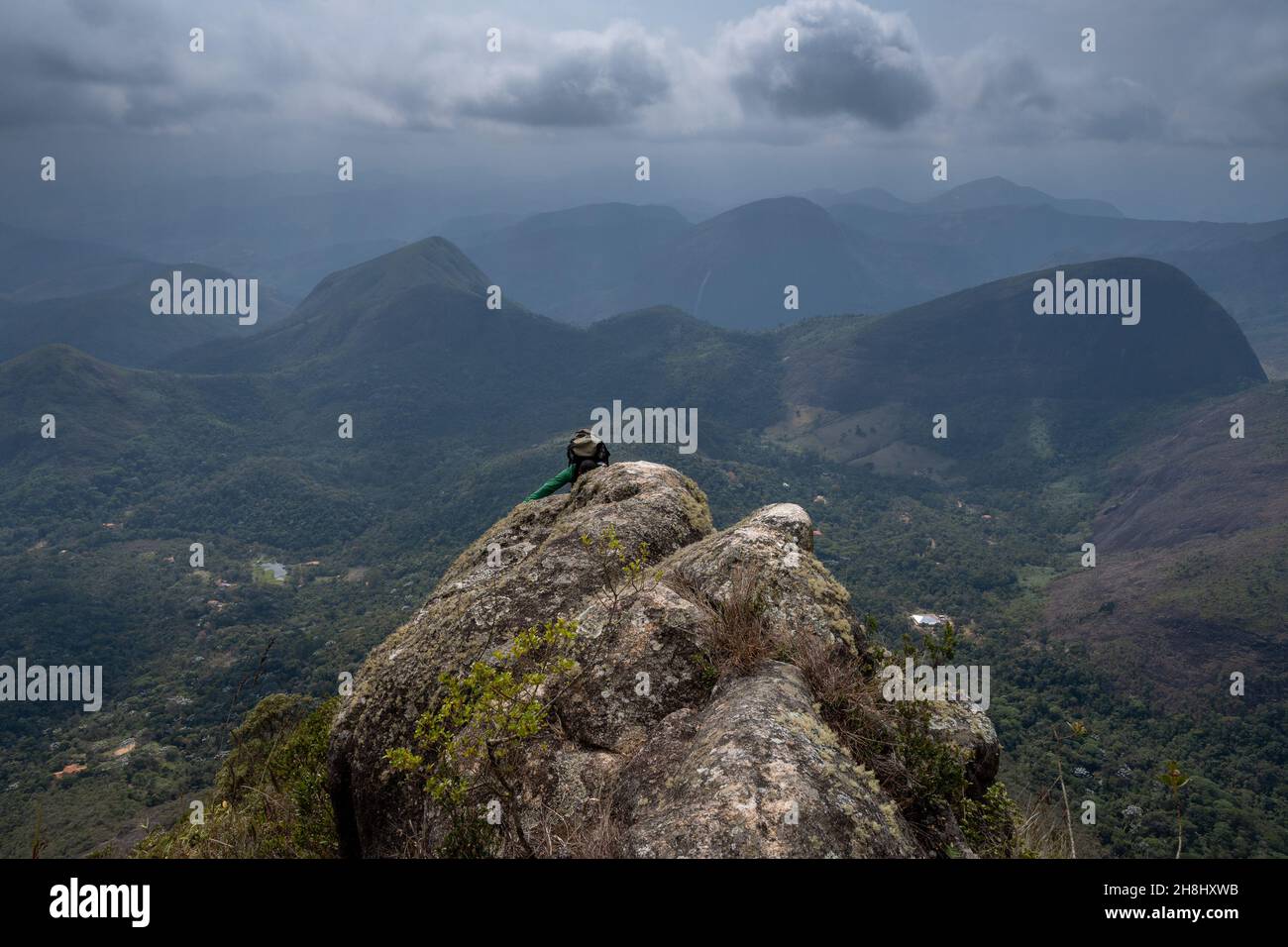 Unidentified hker on the bare rock of Monte de Milho, a granite ...