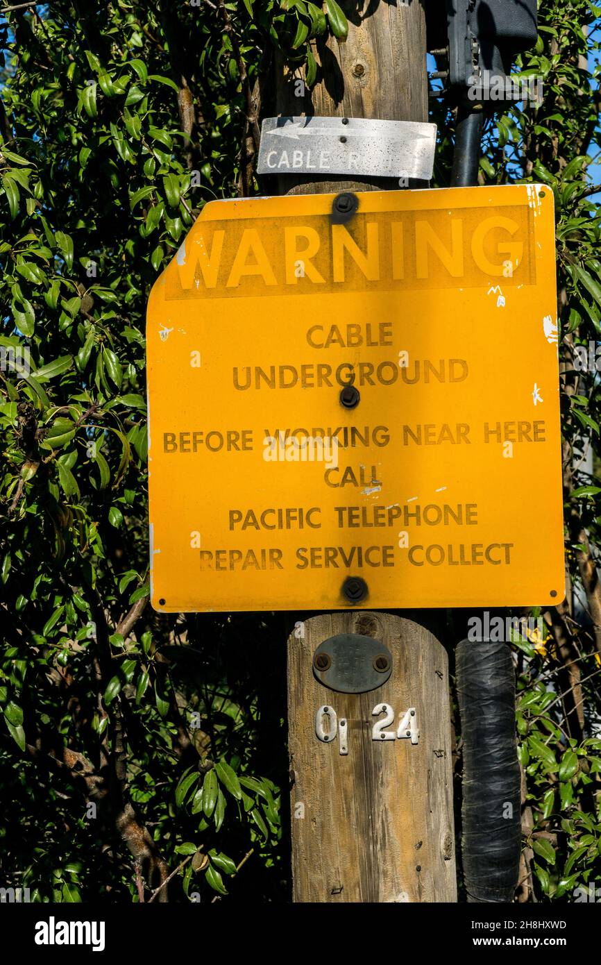An old Pacific Telephone underground cable warning sign in Stanislaus ...
