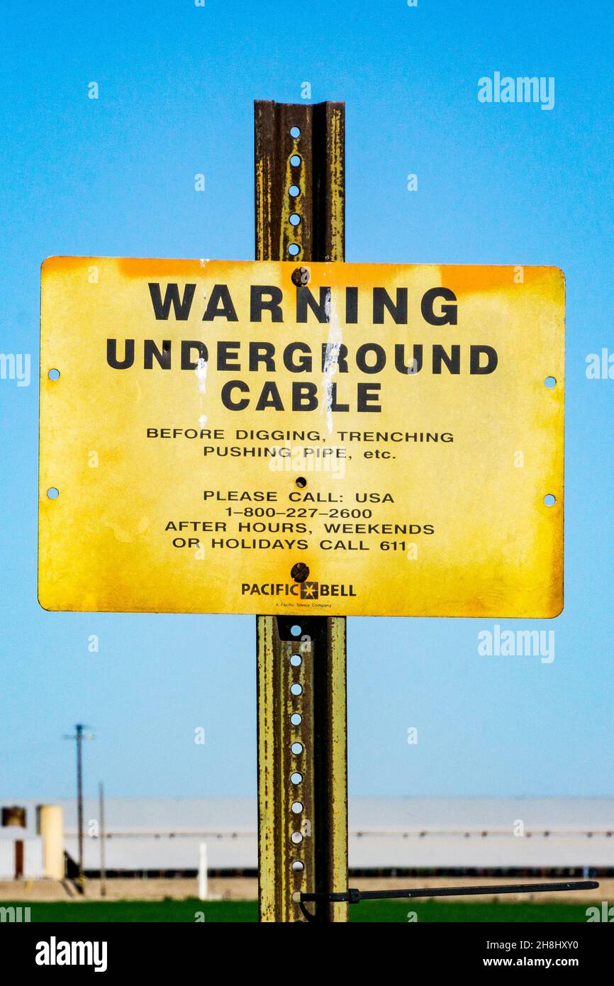 An old Pacific Telephone underground cable warning sign in Stanislaus ...
