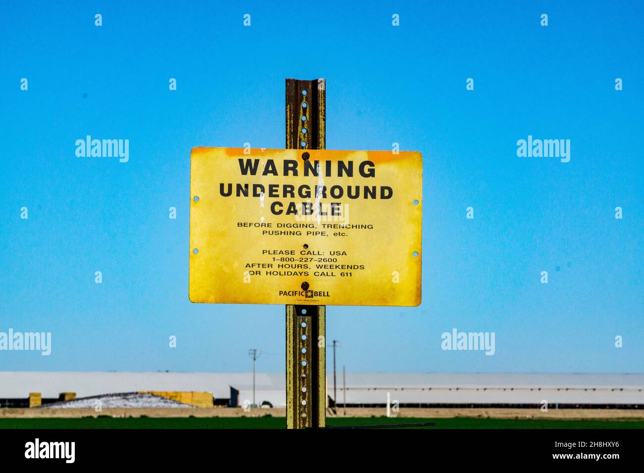 An old Pacific Telephone underground cable warning sign in Stanislaus ...