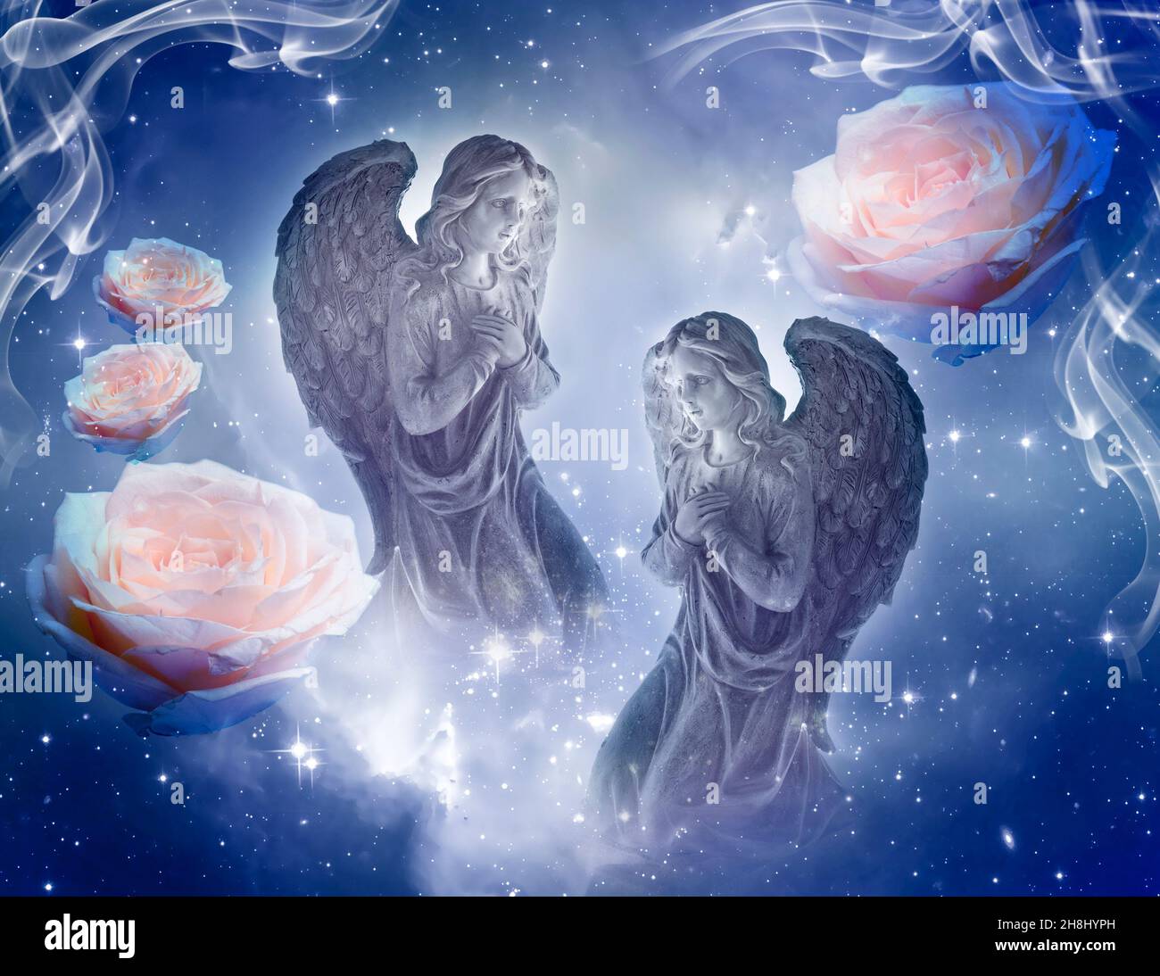 two angels praying Stock Photo - Alamy