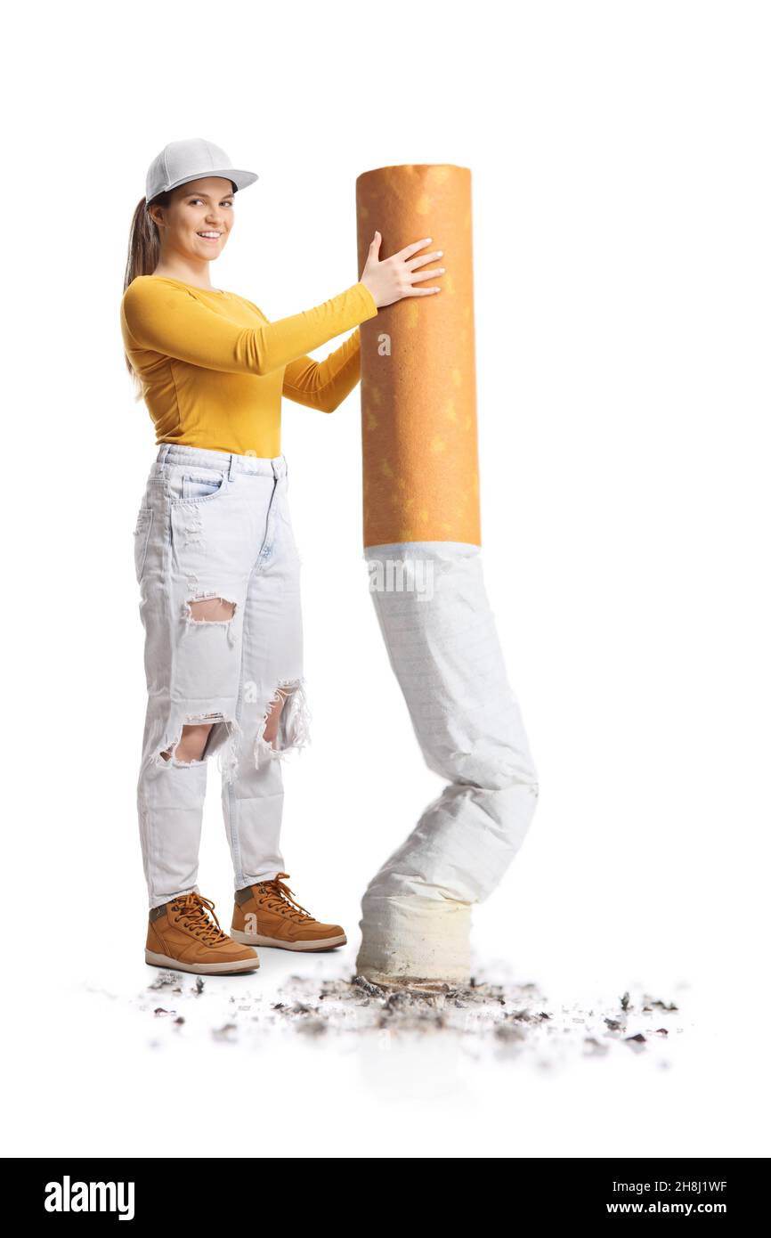 Female teenager putting off a big cigarette isolated on white ...