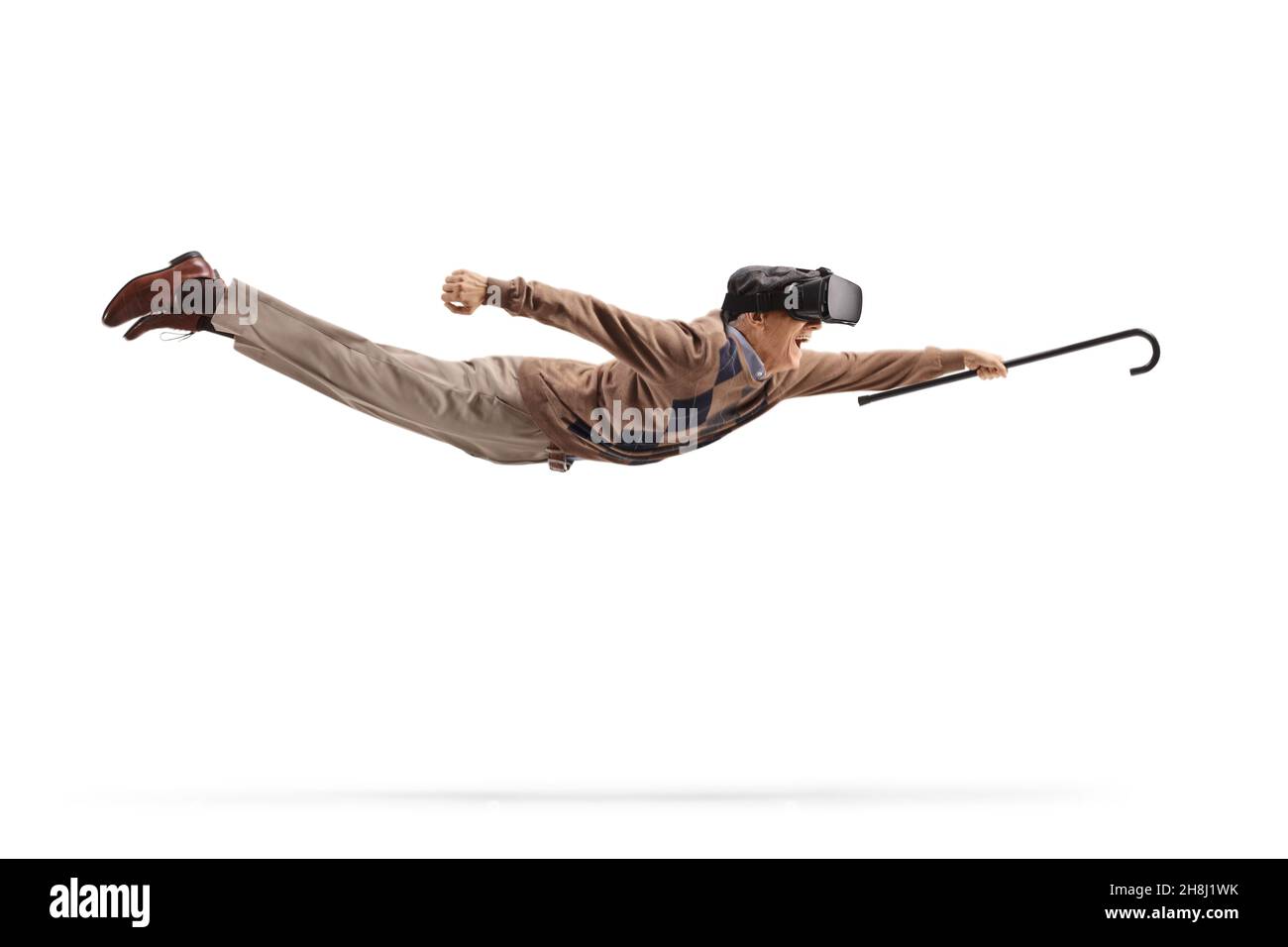 Elderly man with a vr headset flying and holding a walking cane ...