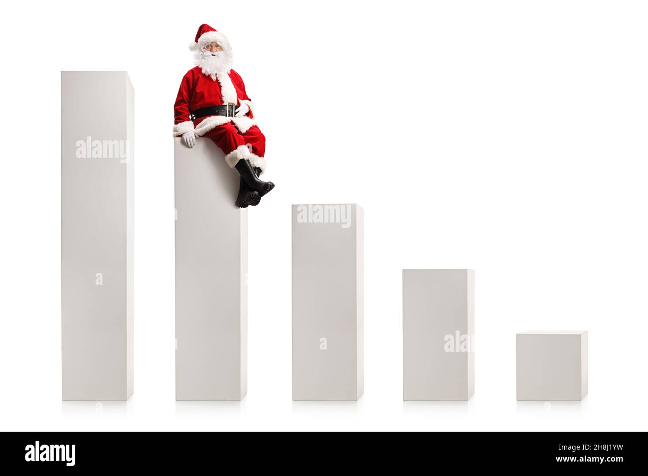 Santa claus sitting on a bar chart and looking at camera isolated on ...