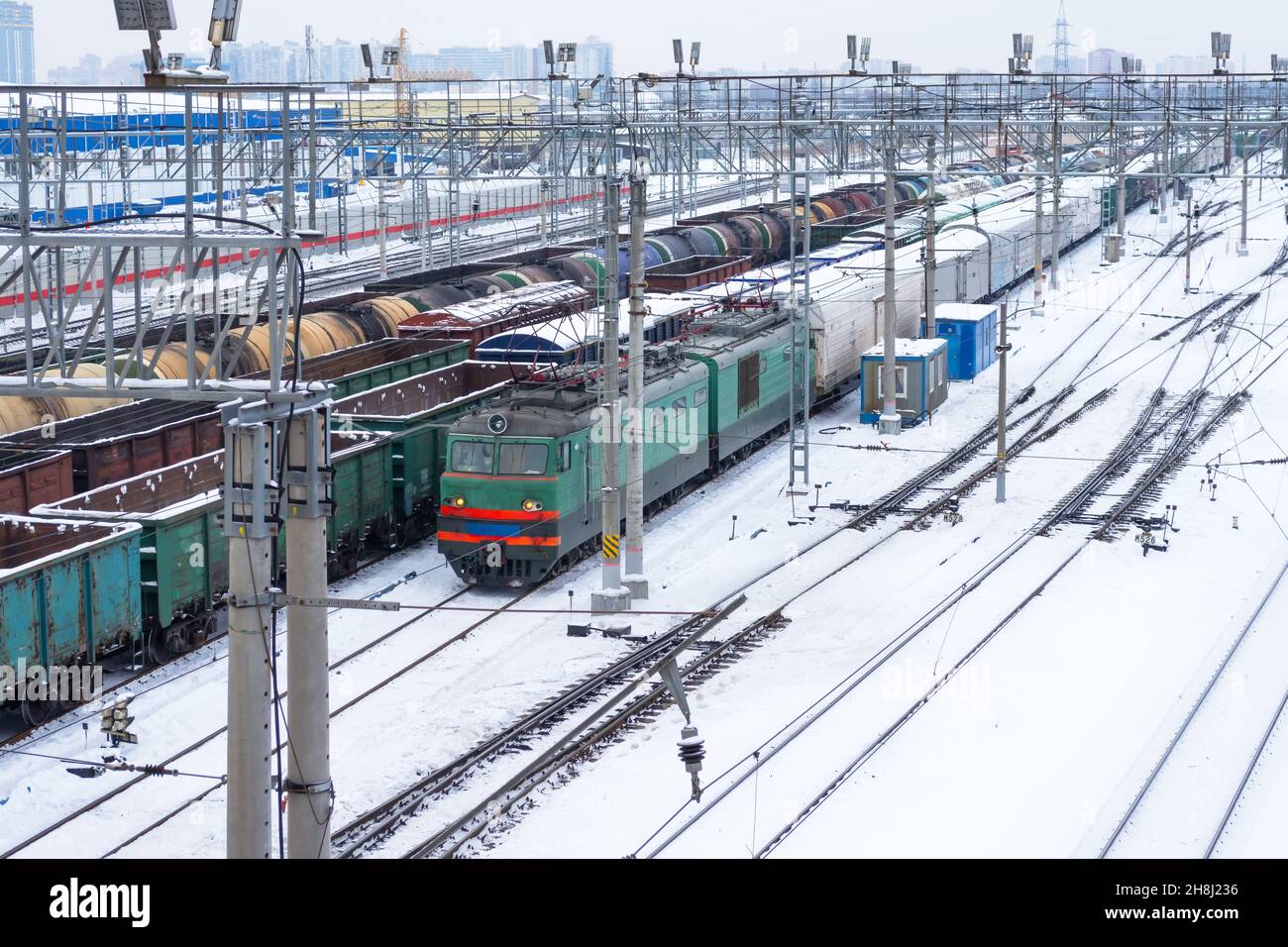 Freight railway station with locomotives in winter Stock Photo - Alamy