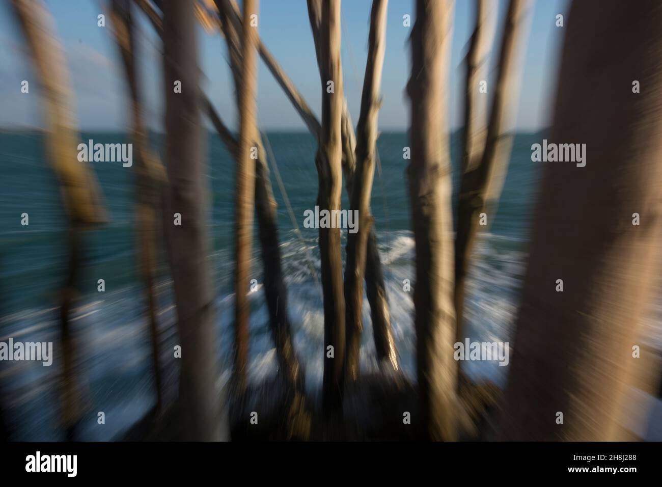poles at sea. overcome obstacles Stock Photo - Alamy