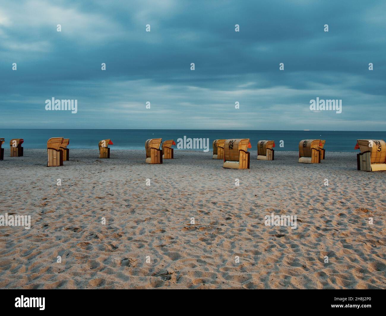 Beach cabins in a German resort Stock Photo - Alamy