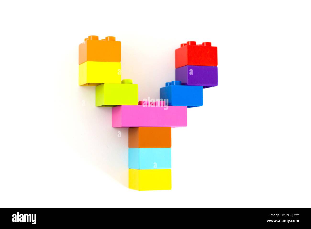 Colorful toy brick letter Y isolated on the white background Stock ...