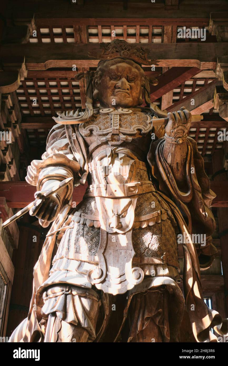 Wooden Guardian Statue at a Buddhist Temple in Nara, Japan Stock Photo ...