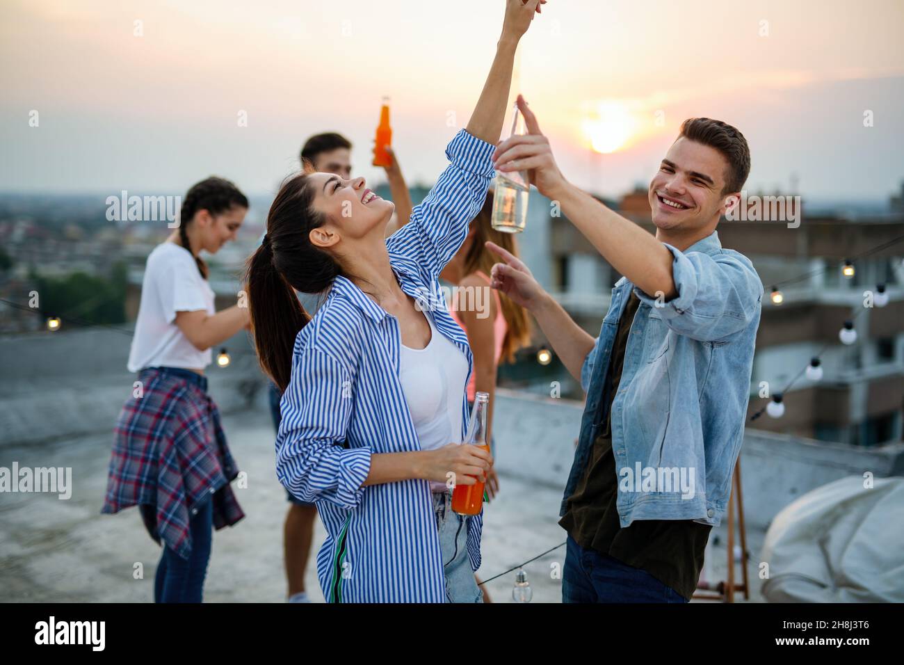 Enjoying party with friends. Group of happy people having fun together ...